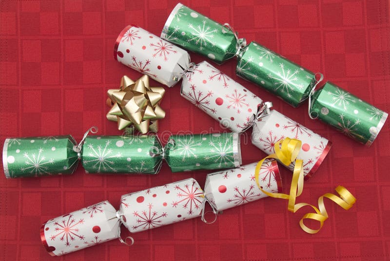 Christmas Crackers on Red Background Stock Photo - Image of group ...