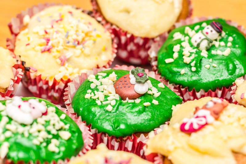 Christmas Cupcakes with Green and Yellow Icing Stock Image - Image of ...