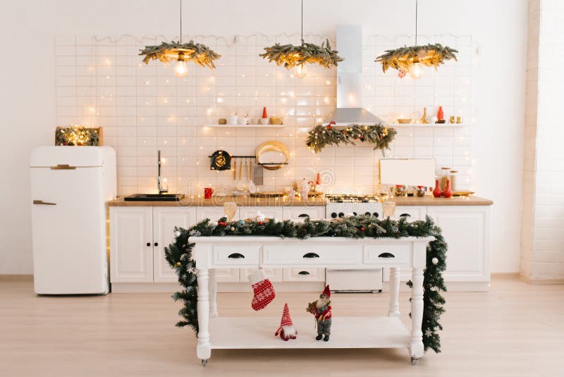 Christmas Decor. Bright White Kitchen Interior with Bright Garlands and ...