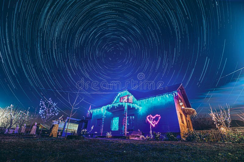 Christmas Decorated House Under Star Trail Night Sky Stock Image ...