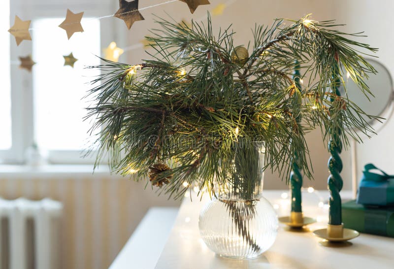 Christmas Decoration with Branches of Pine Tree and String Lights in ...