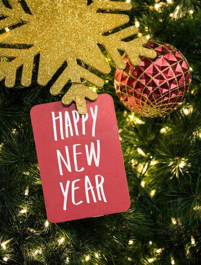 Closeup of a Happy New Year Tag Stock Photo - Image of calligraphy ...