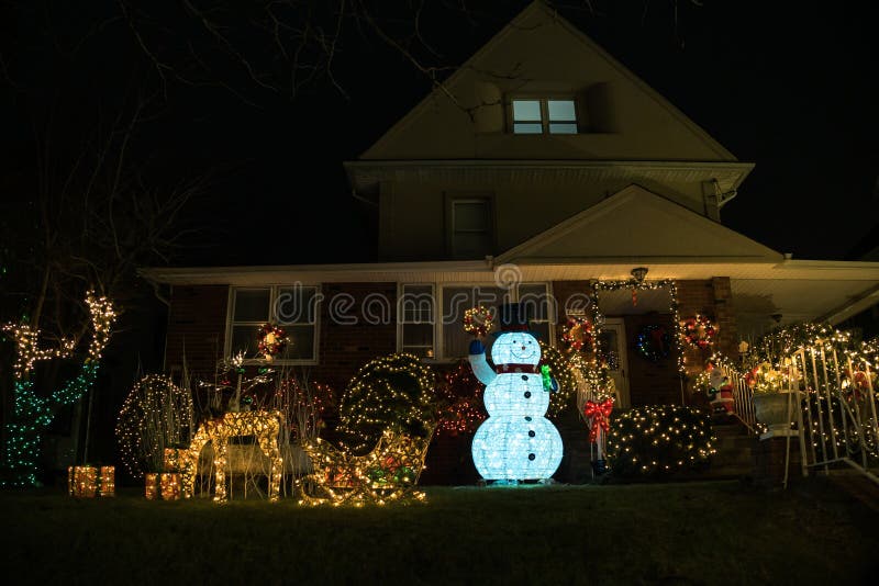 Christmas Decorations Glowing Outside at Night in Front of a House ...