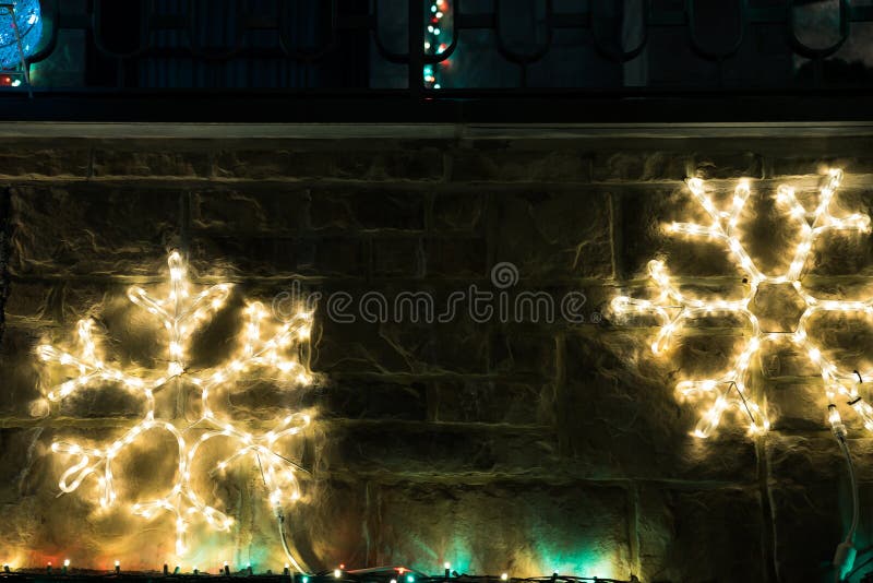 Christmas Decorations Glowing Outside at Night in Front of a House ...