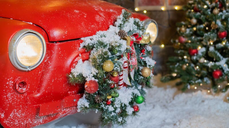 Christmas Decorations on a Red Classic Car Outdoors. Santa Claus Car ...