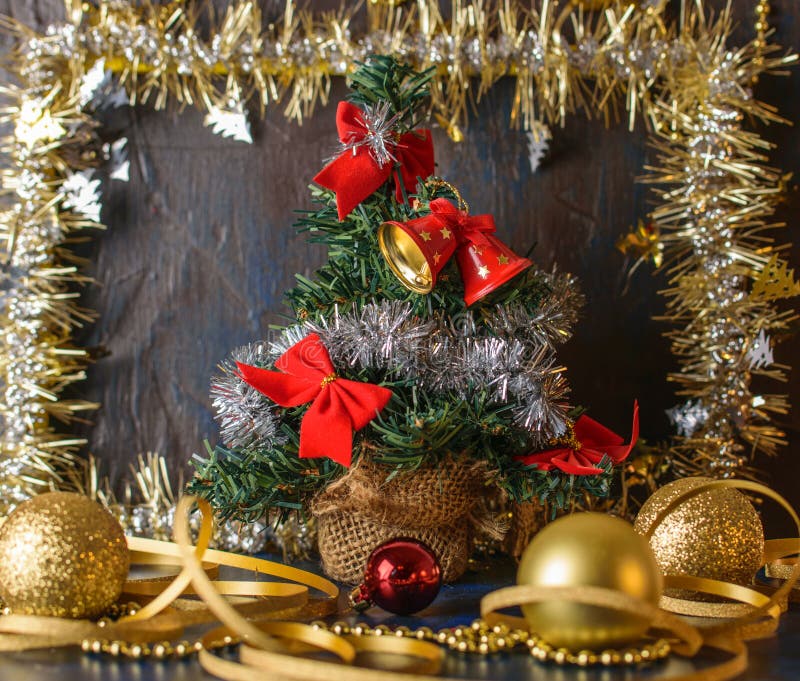 Christmas Decorations with a Small Artificial Christmas Tree with Red ...