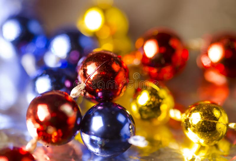 Christmas Decorations. Strings of Sharp Red and Sharp and Blue Beads ...