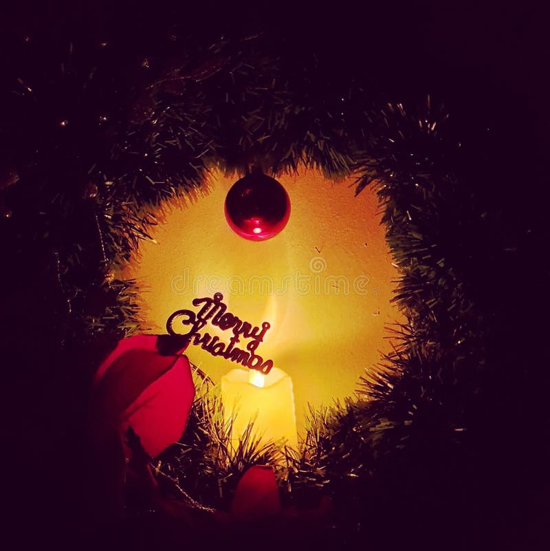 Christmas Decorations on the Wall in Amber Light Stock Photo - Image of ...