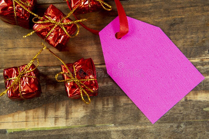 Decorative Christmas Elements Next To Card with Red Ribbon and Space To ...