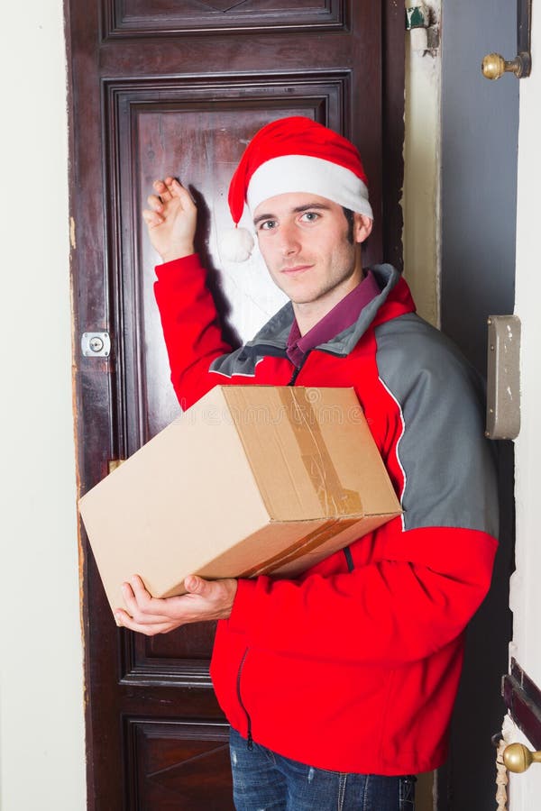Delivery Boy for Christmas stock photo. Image of deliverer - 16921396