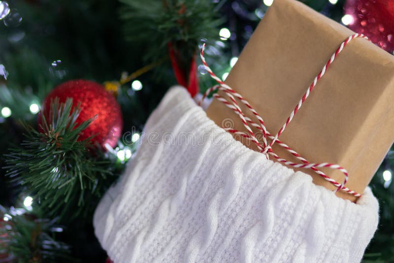 Christmas Delivery,christmas Present in Santa Sock Hanging on Christmas ...
