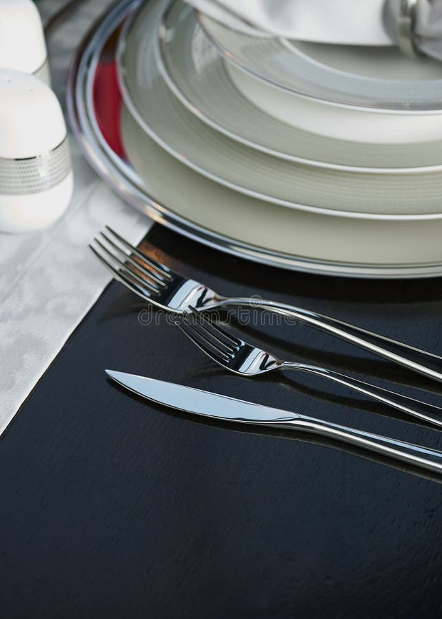 Christmas Dinner Setting with Elegance Silverware and Porcelain Stock ...