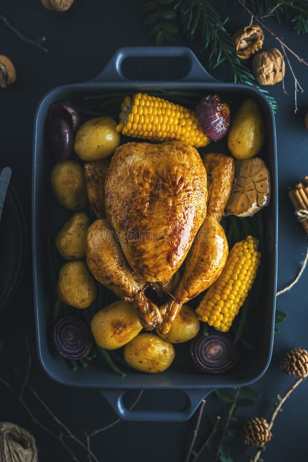Christmas Dinner Table with Chicken on Dark Stock Photo - Image of ...