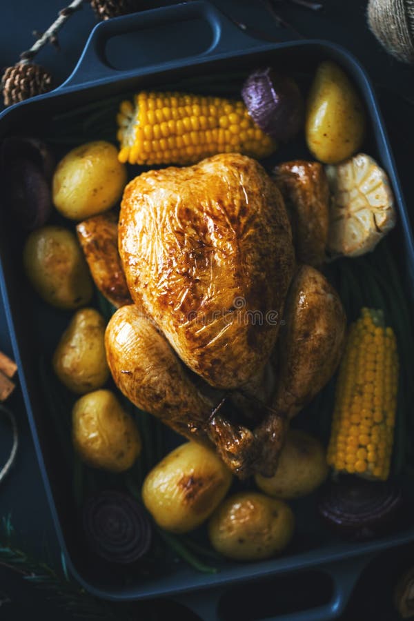 Christmas Dinner Table with Chicken on Dark Stock Image - Image of ...