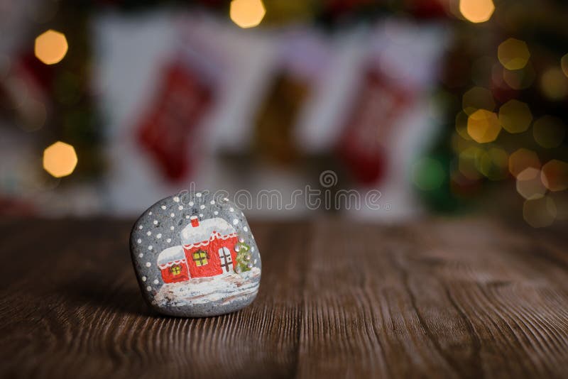Christmas Drawing in Stone that is on Wooden Table. Stock Photo - Image ...