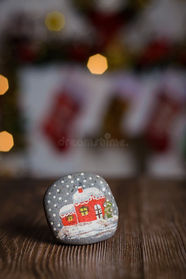 Christmas Drawing in Stone that is on Wooden Table. Stock Photo - Image ...