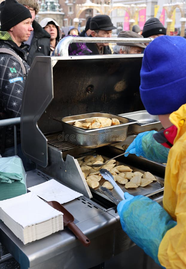 Christmas Eve for Poor and Homeless on the Main Square in Cracow ... Christmas Eve for Poor and Homeless on the Main Square in Cracow ...