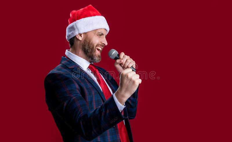 Christmas Event Host Man Singing in Santa Hat, Copy Space. Event Host ...
