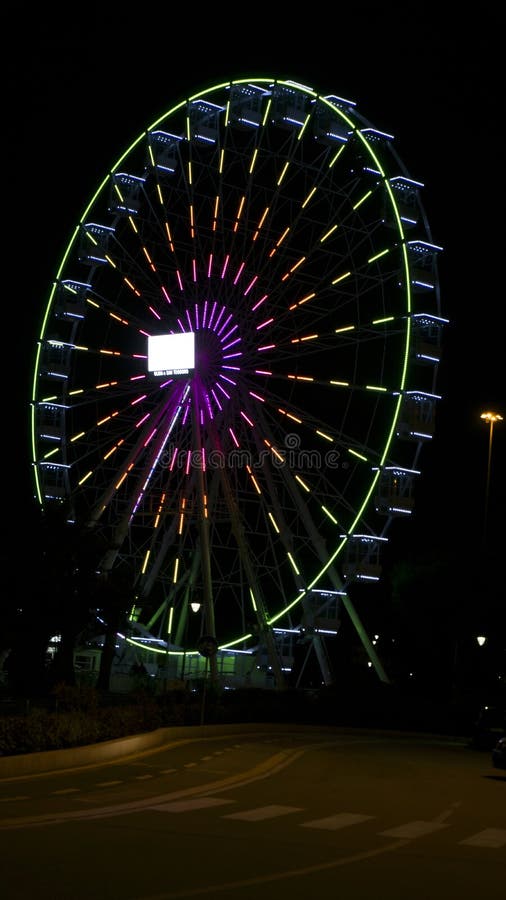 Christmas Ferris Wheel at Night with Many Colors Stock Image - Image of ...