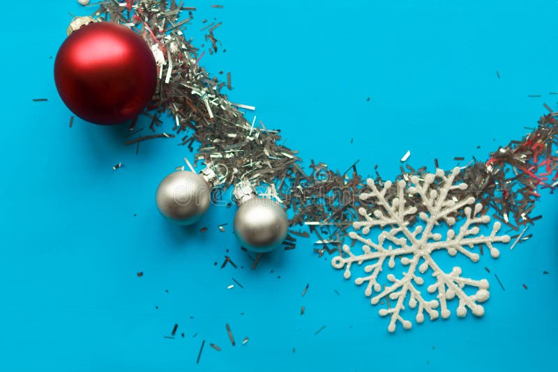 Christmas Frame with Silver Tinsel and Decorations on Blue Background ...