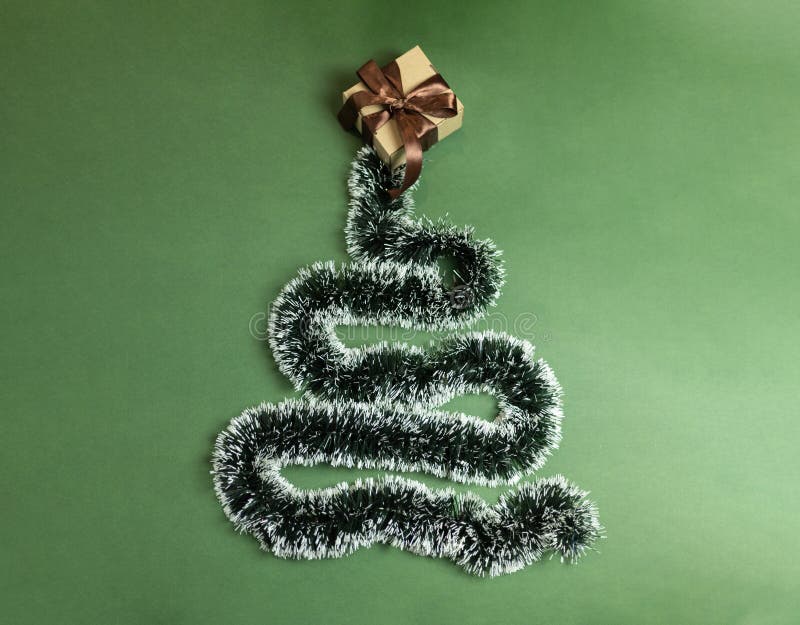 Christmas Garland Nested in the Form of a Christmas Tree with a Gift ...