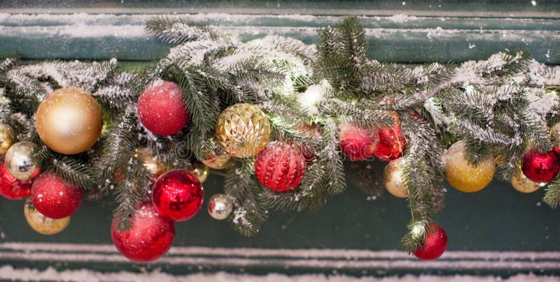 Christmas Garland with Snow and Decorations Stock Photo - Image of ...