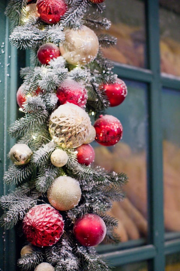 Christmas Garland with Snow and Decorations Stock Photo - Image of ...