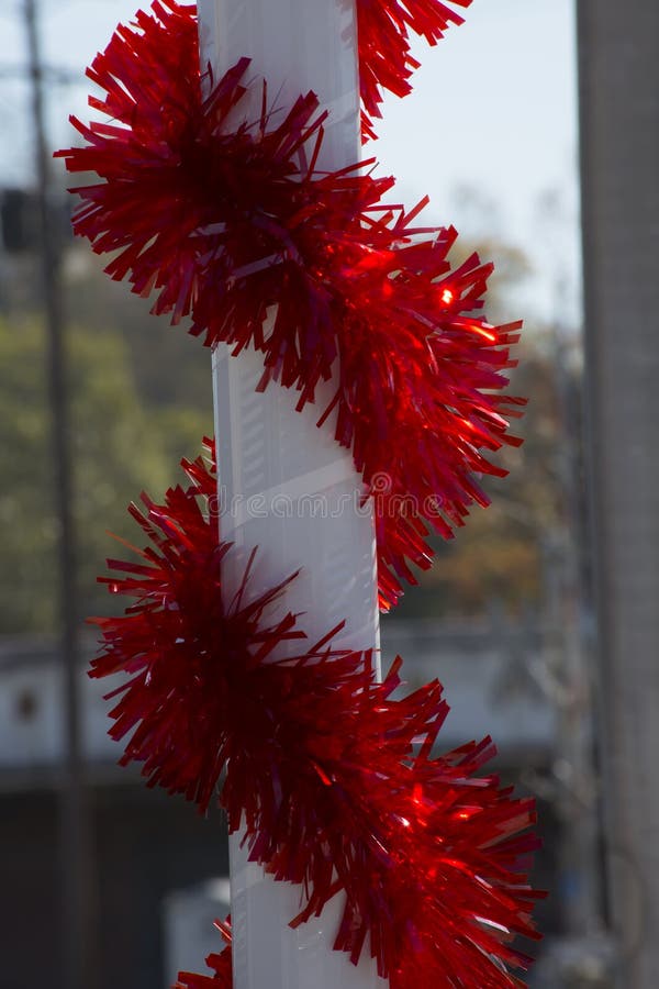 Christmas Garland Wrapped Around Pole Stock Photo - Image of festive ...