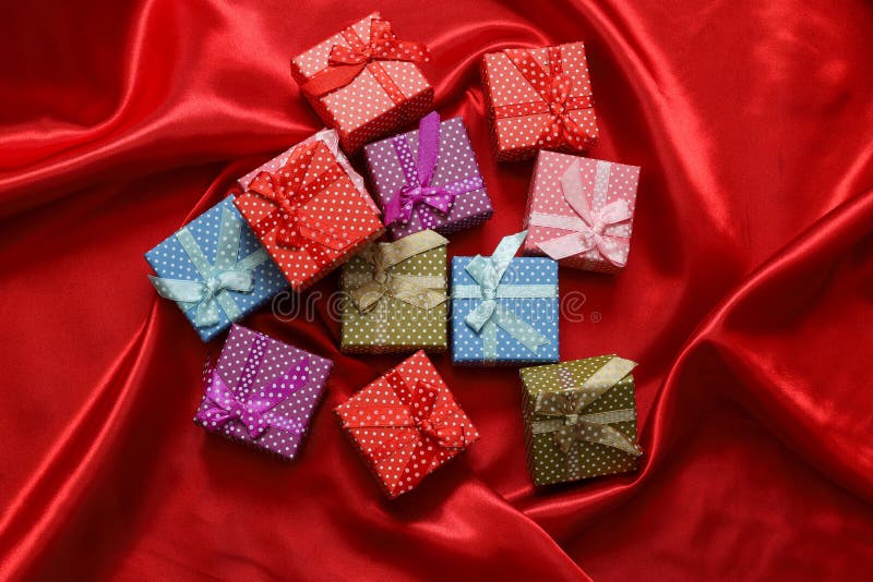 Christmas Gift Boxes on the Red Cloth Stock Image - Image of case ...
