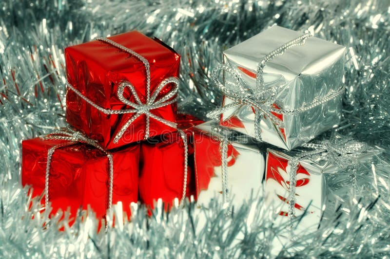 Christmas Gift Boxes and Silver Tinsel Stock Image - Image of gift ...