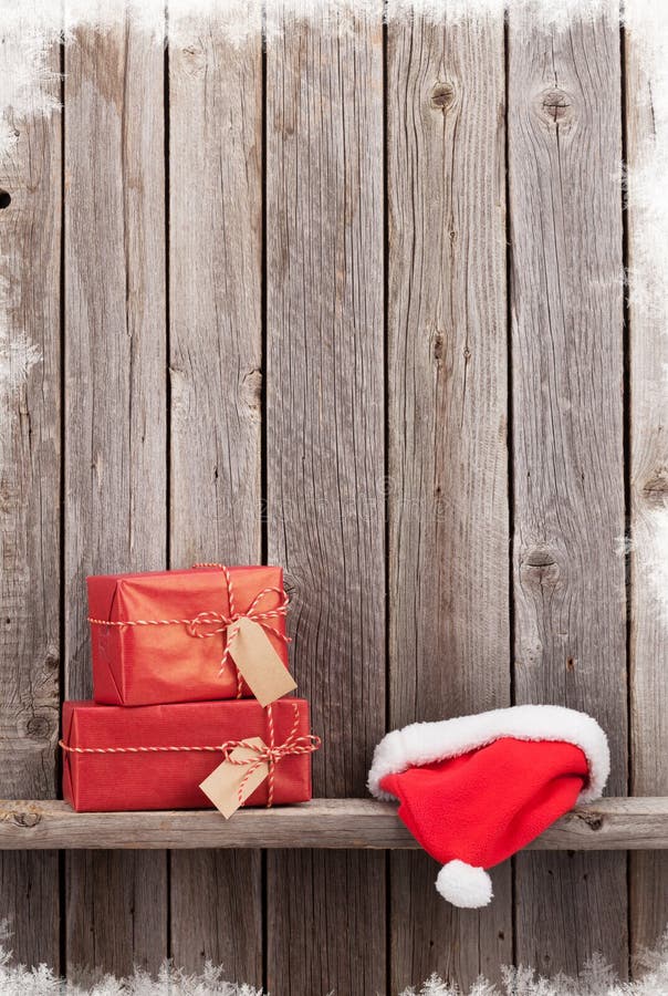 Christmas Gift Boxes and Santa Hat Stock Photo - Image of vintage ...