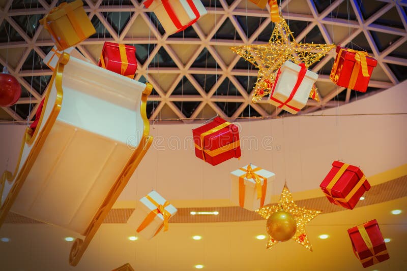 Christmas Gift Boxes Sleigh and Holiday Decorations are Suspended from ...