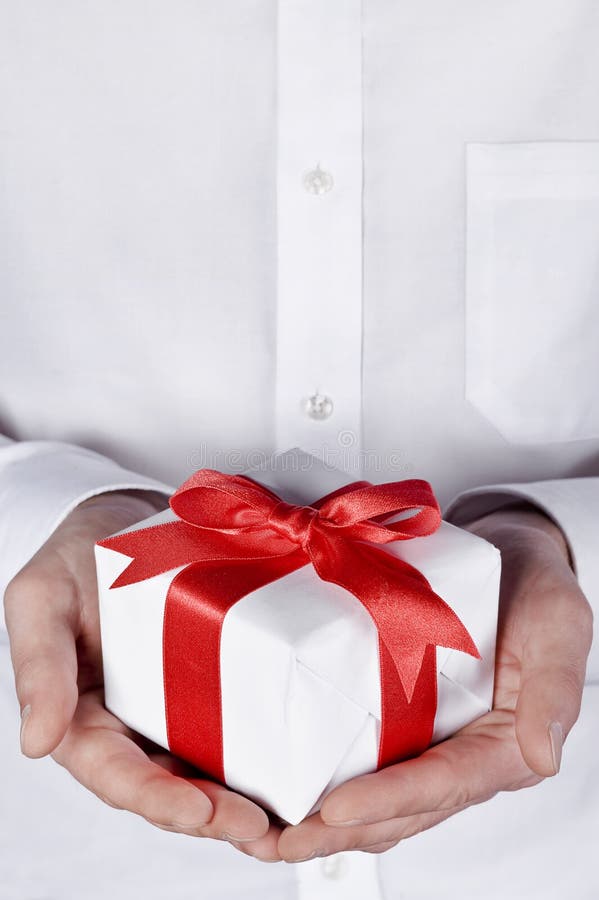 Christmas gift giving stock image. Image of hands, human - 22134237