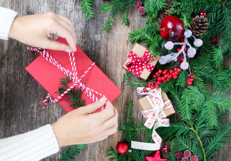 Christmas gift giving stock photo. Image of greeting - 260249086