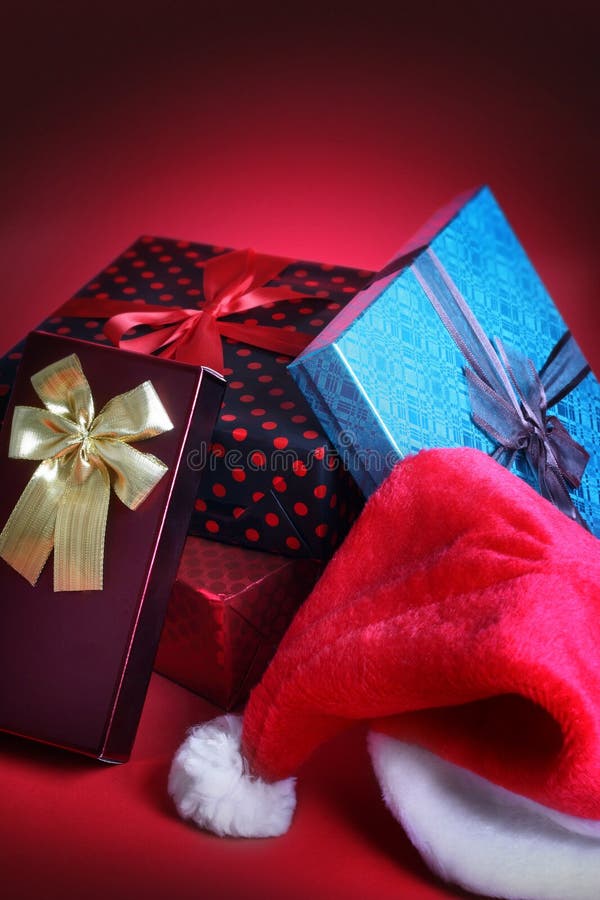 Christmas Gift and Santa Hat Stock Image - Image of celebration, santa ...