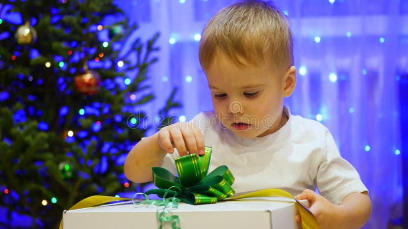 Christmas Gift Surprise - a Child Opens Present Stock Image - Image of ...