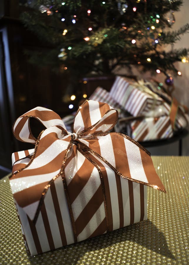 A Christmas Gift Wrapped in Red and White Stripes. Stock Image - Image ...