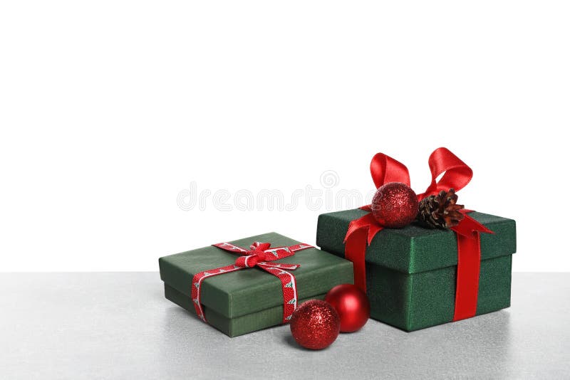 Christmas Gifts in Beautiful Decorated Boxes on Grey Table Against ...
