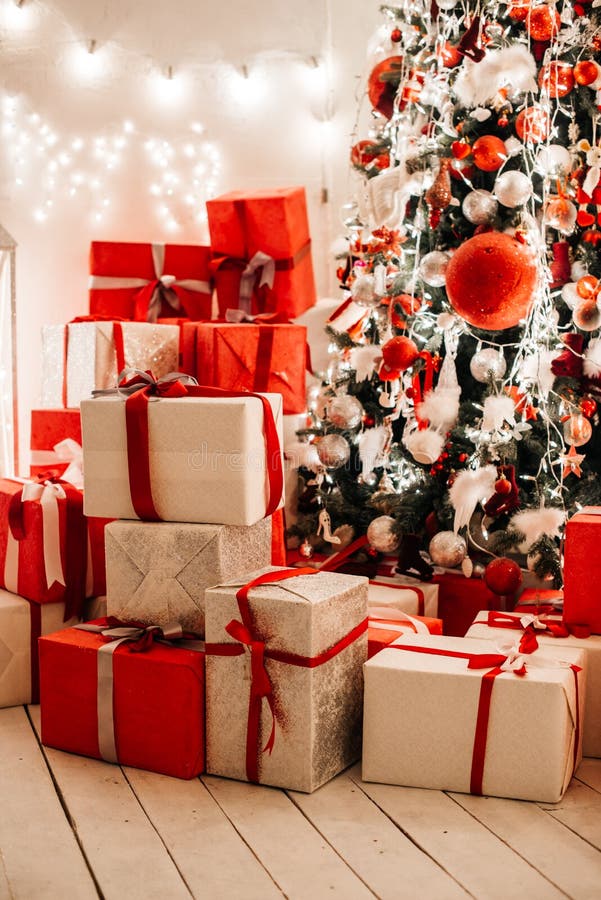 Christmas Gifts in Beautiful Packages Lie Under the Christmas Tree ...