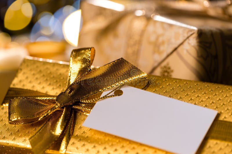 Christmas Gifts with Blank Label Stock Image - Image of ribbon, giving ...