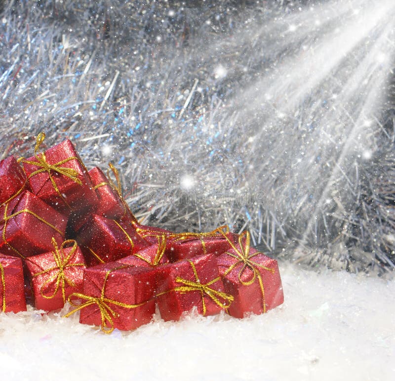Christmas gifts in snow stock photo. Image of snow, garland - 22230556