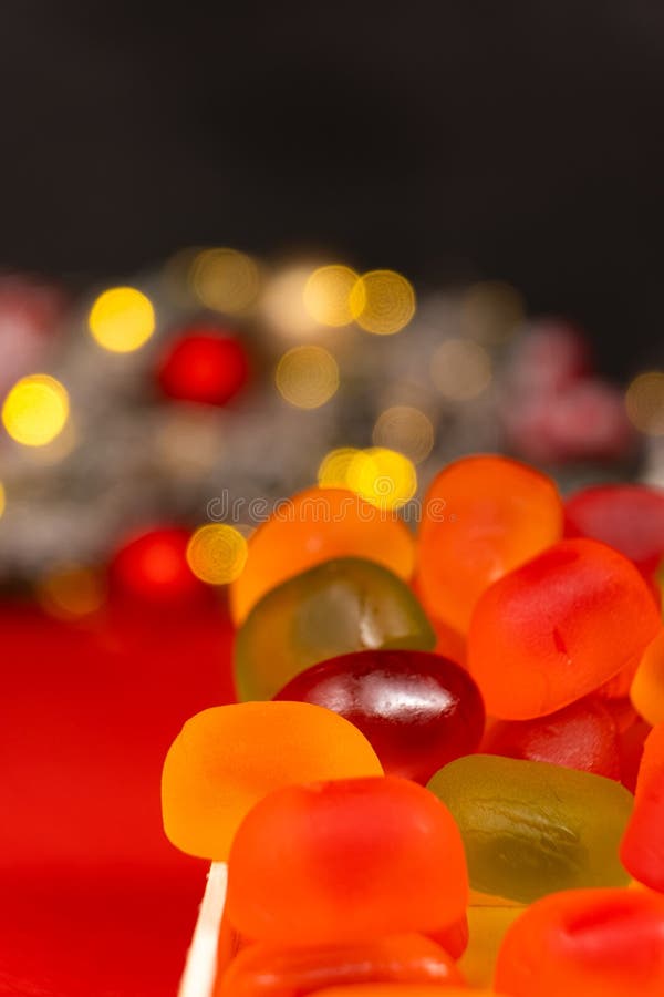 Christmas Gummy Colorful Candy on Garland Background. Stock Image ...