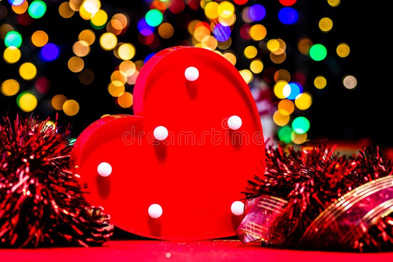 Christmas Heart-shaped Decoration and Ornaments on a Blurred Lights ...