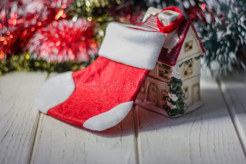 Christmas House Decorated with Big Santa Boot on Pipe. Stock Photo ...