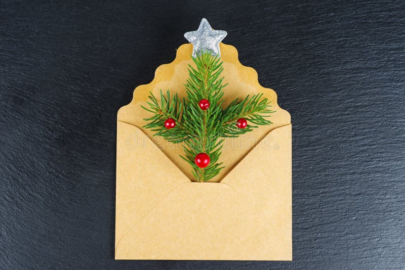 Christmas Letter Fir Branch with Silver Star in a Mail Envelope Stock ...