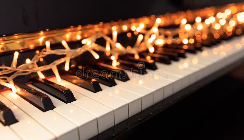 Christmas Lights on a Piano Keyboard, Front View Stock Image - Image of ...