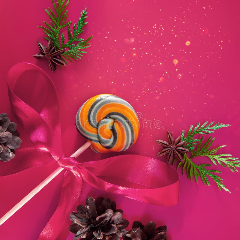 Christmas Magic Wand in the Form of a Candy on a Pink Background Stock ...