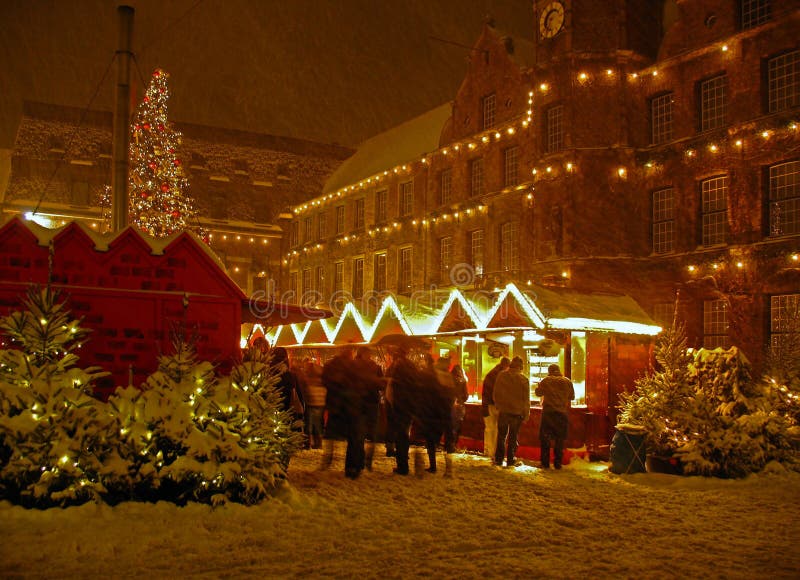 Christmas Market in snow stock image. Image of illuminated - 22266405