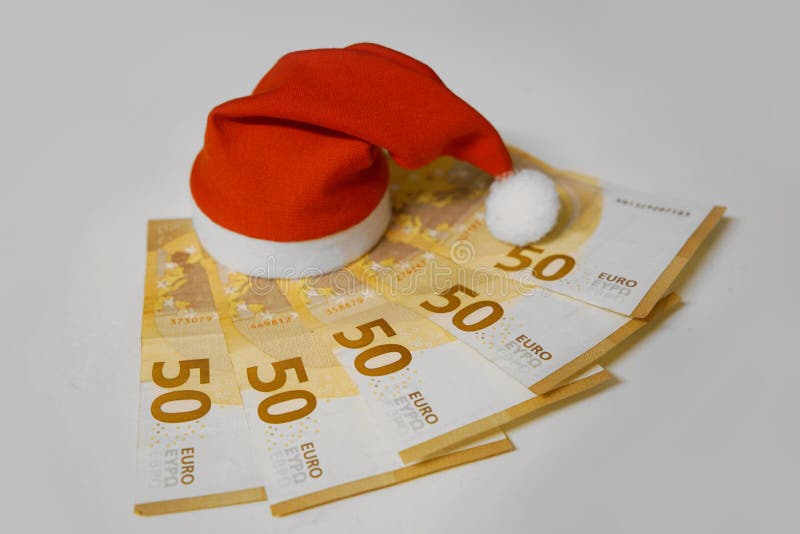 Christmas Money Concept with Christmas Hat and Bank Notes Stock Photo ...