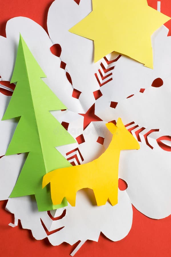 Christmas Paper Figures Made by Children, on Red Paper Sheet Stock ...
